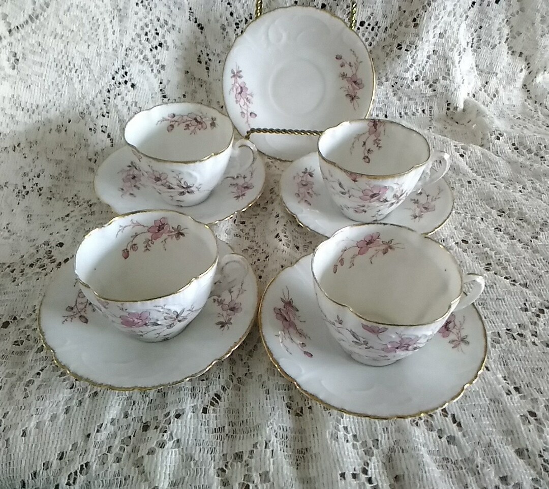 By Springer & Co Elbogen "mignon" Austria is a Set of 5 Saucers and 4 ...
