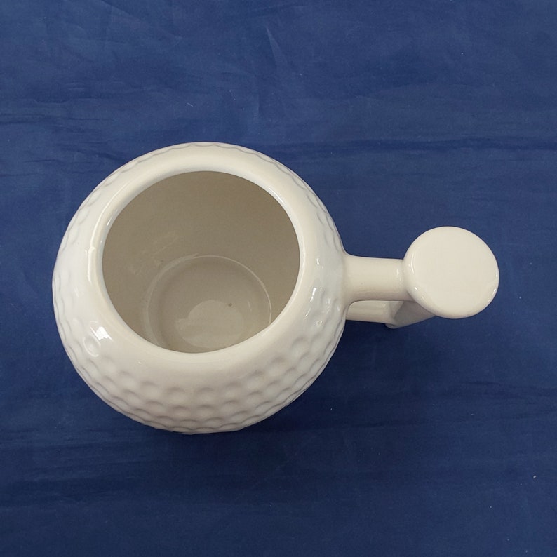 A White Ceramic Golf Ball Shaped 15 Oz Mug With a Golf Tee for a Handle ...