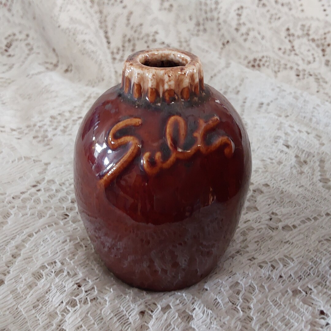A Vintage Jug Style Hull Salt Shakers With a Drip Glaze Around the Rim ...