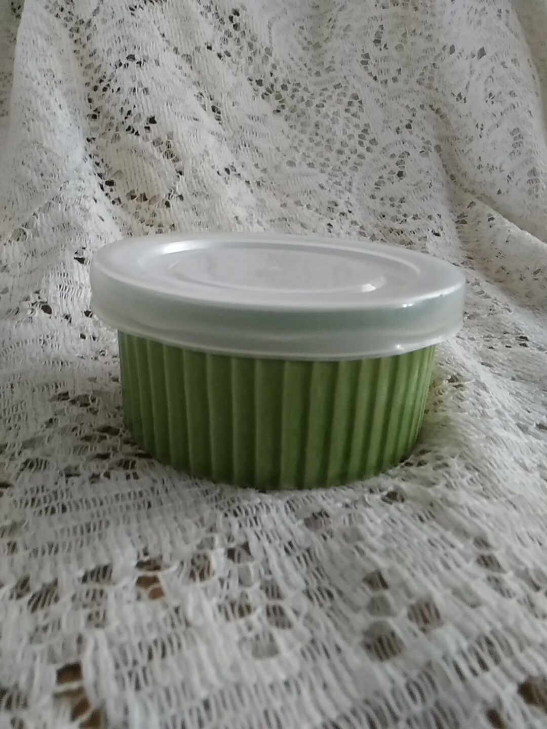A 6 Oz Green Glazed Ceramic Ribbed Ramekin That is White on the Inside ...