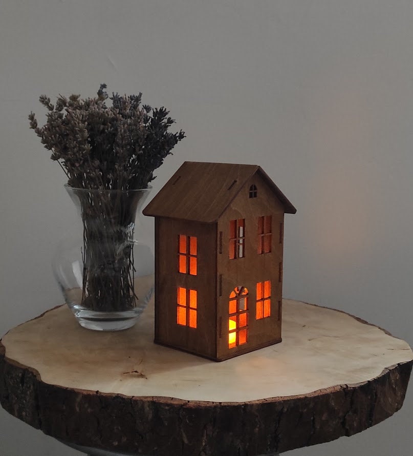 A Wooden House With Lighting. Decorative House. Home Decor With ...