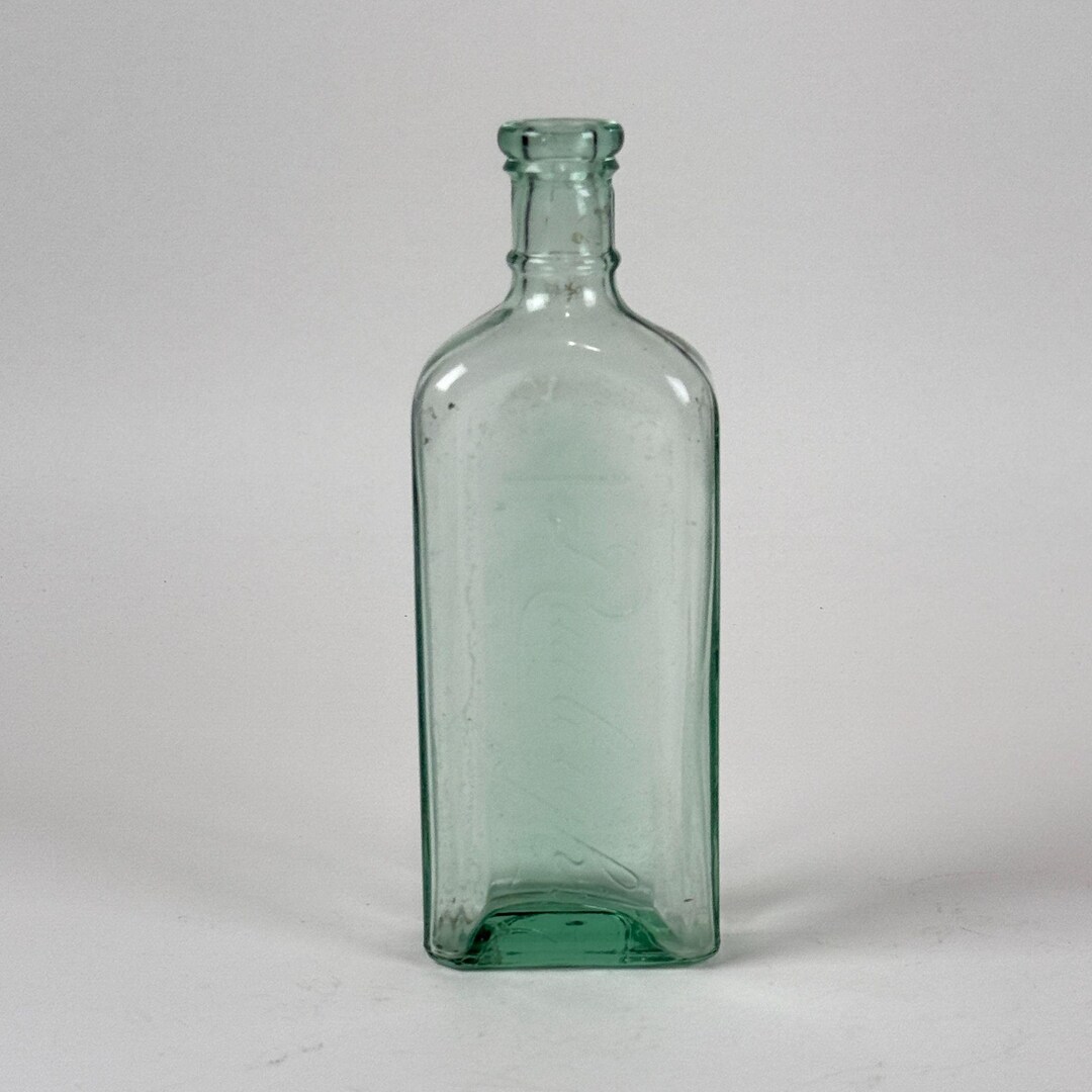 Antique Raulieghs Pale Green Glass Bottle With Raised Lettering - Etsy