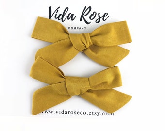 Mustard yellow bows | Etsy