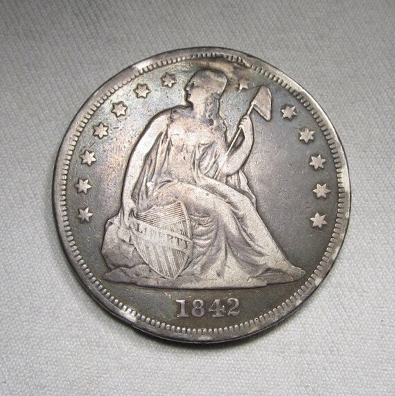 Seated Liberty Dollar