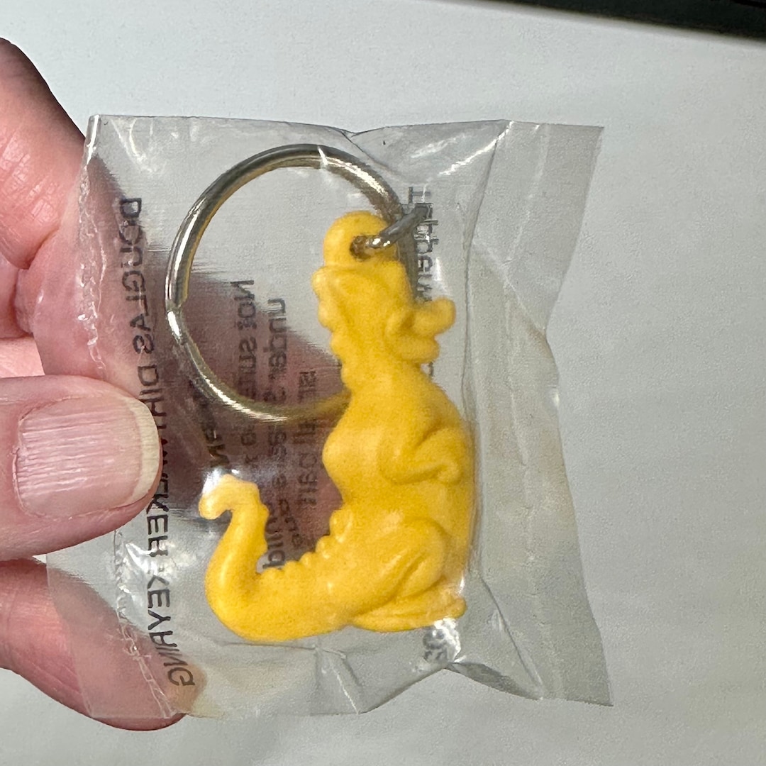 Vintage Tupperware Douglas Dirt Walker Yellow Dragon Dinosaur Keychain ...
