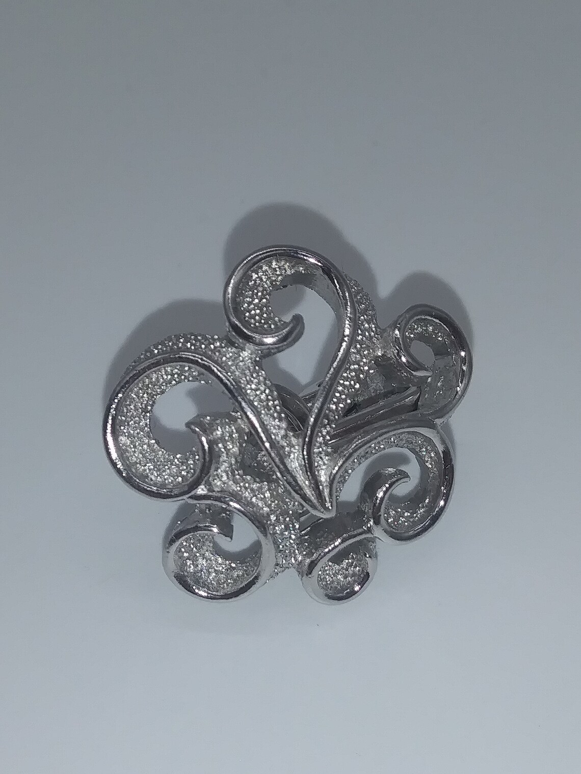 Vintage Crown Trifari Brushed Silver Tone Textured Frosted Swirl Floral