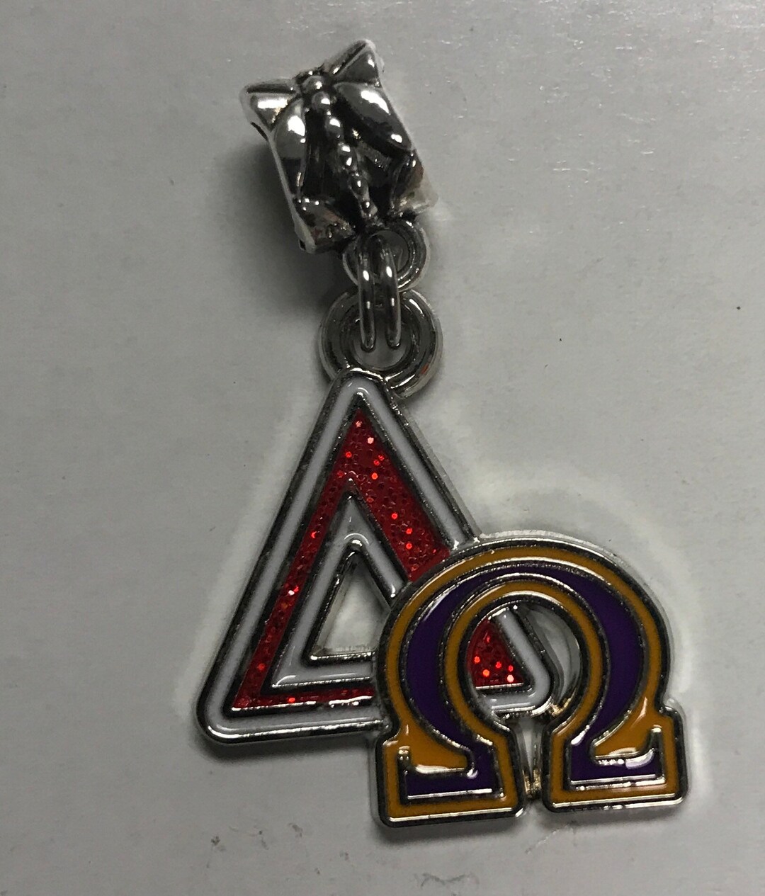 Que Delta Charm - Etsy