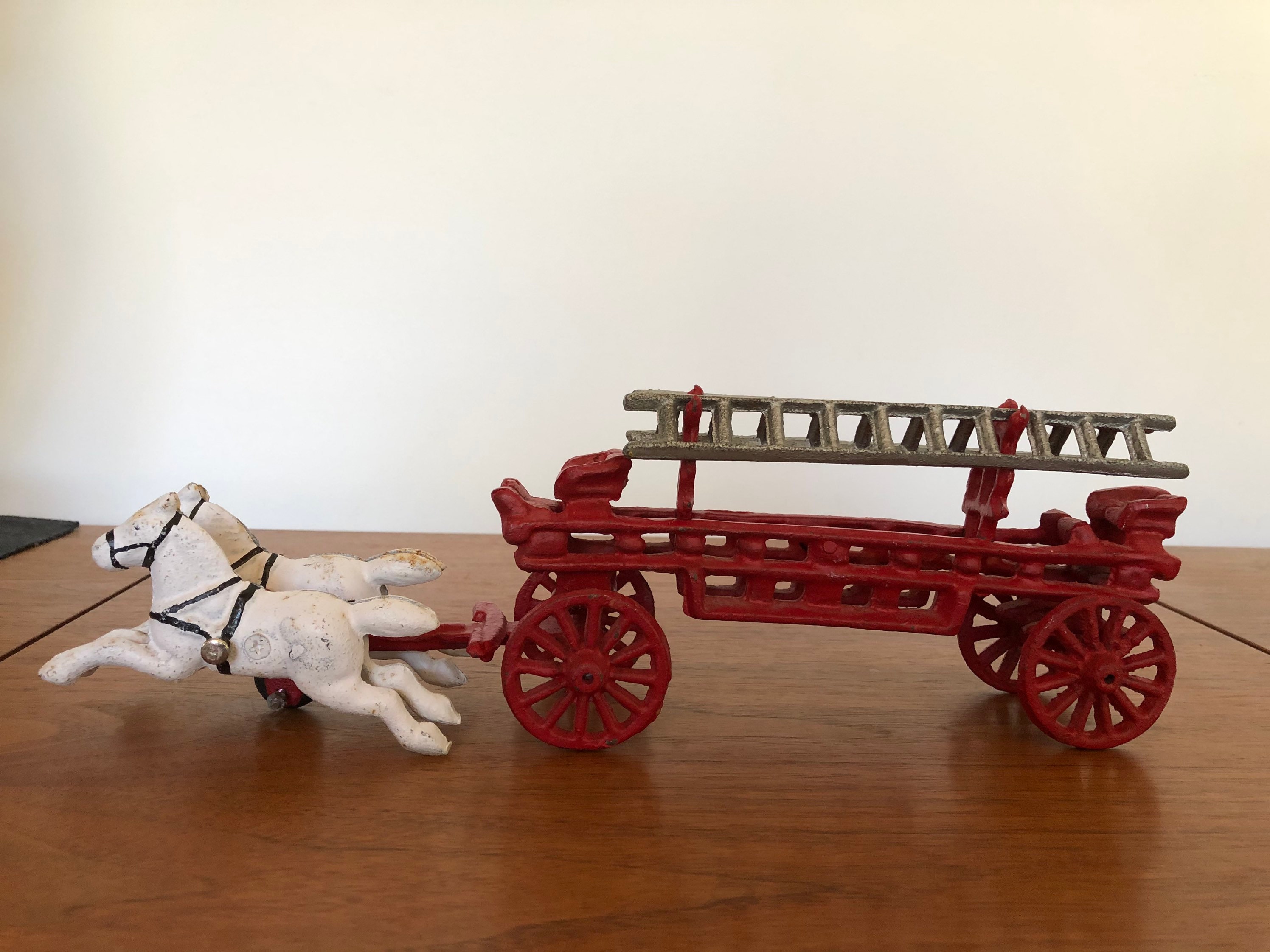 Vintage Cast Iron Red Ladder Truck Pulled by a Pair of White Horses ...
