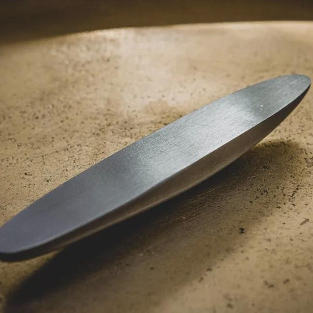 10cm Steel Rattleback - Physics Toy, Wobble/celtic Stone - Etsy