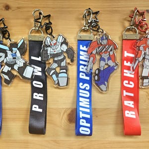 TRANSFORMERS 2.5 Inch Charms With Lanyards - Wristlet Lanyard - Etsy
