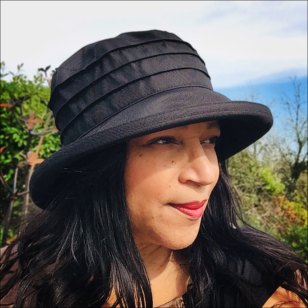 Fully Waterproof Black Rain Hat for Ladies Who Need to Stay Smart as ...
