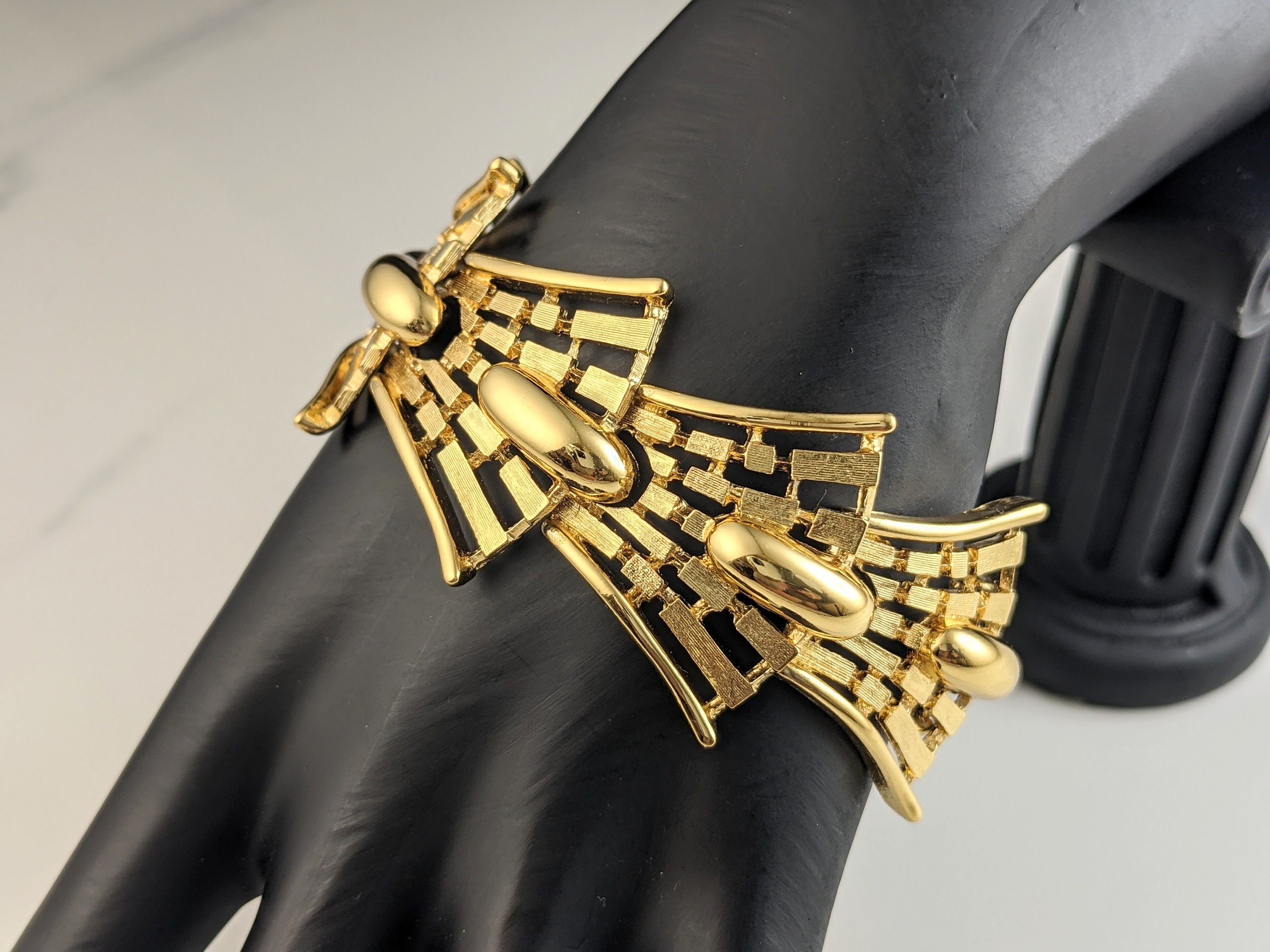 Beautiful Gold-tone Large Openwork design Bracelet by MONET Jewellery