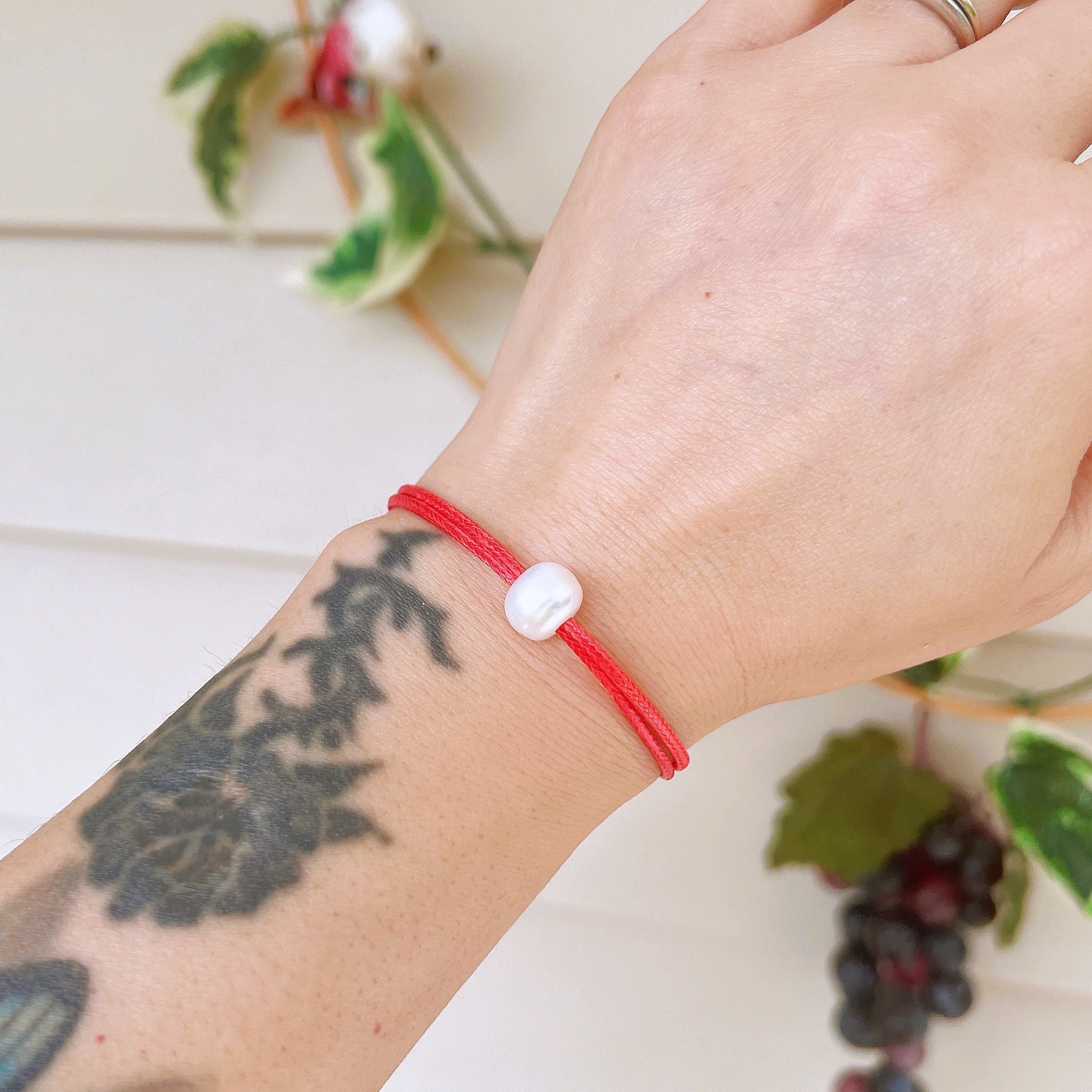 String Of Pearls Tattoo