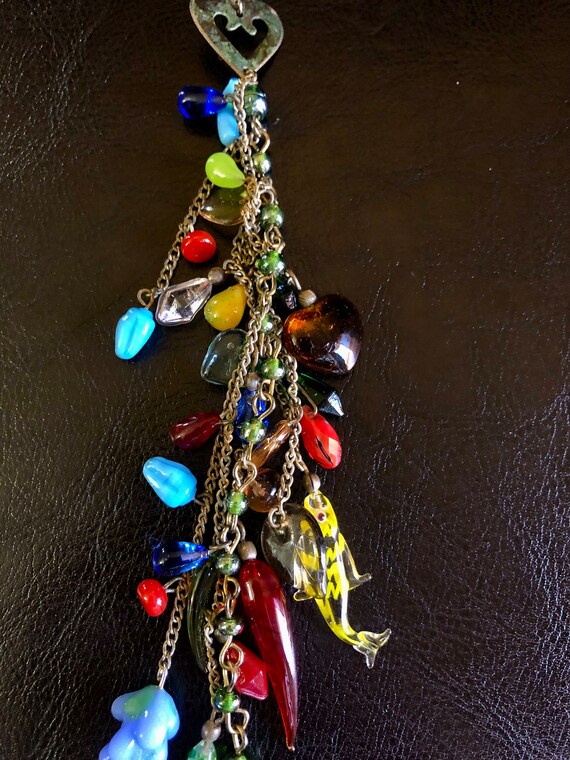 Upcycled Glass Charm necklace loaded with old Glass C… - Gem