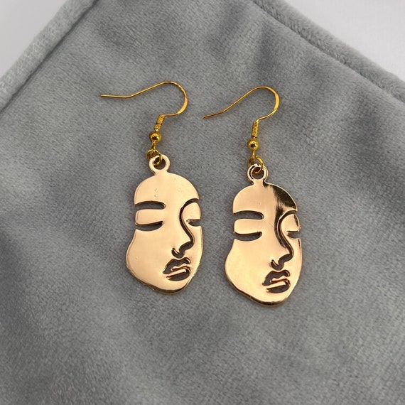 Face earrings etsy store