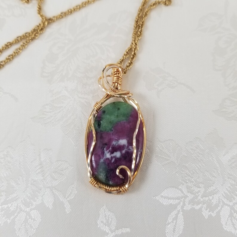 Ruby Zoisite Pendant Necklace Oval Cabochon With Gold Wire Wrapping Dangling on a 18kt Gold ...