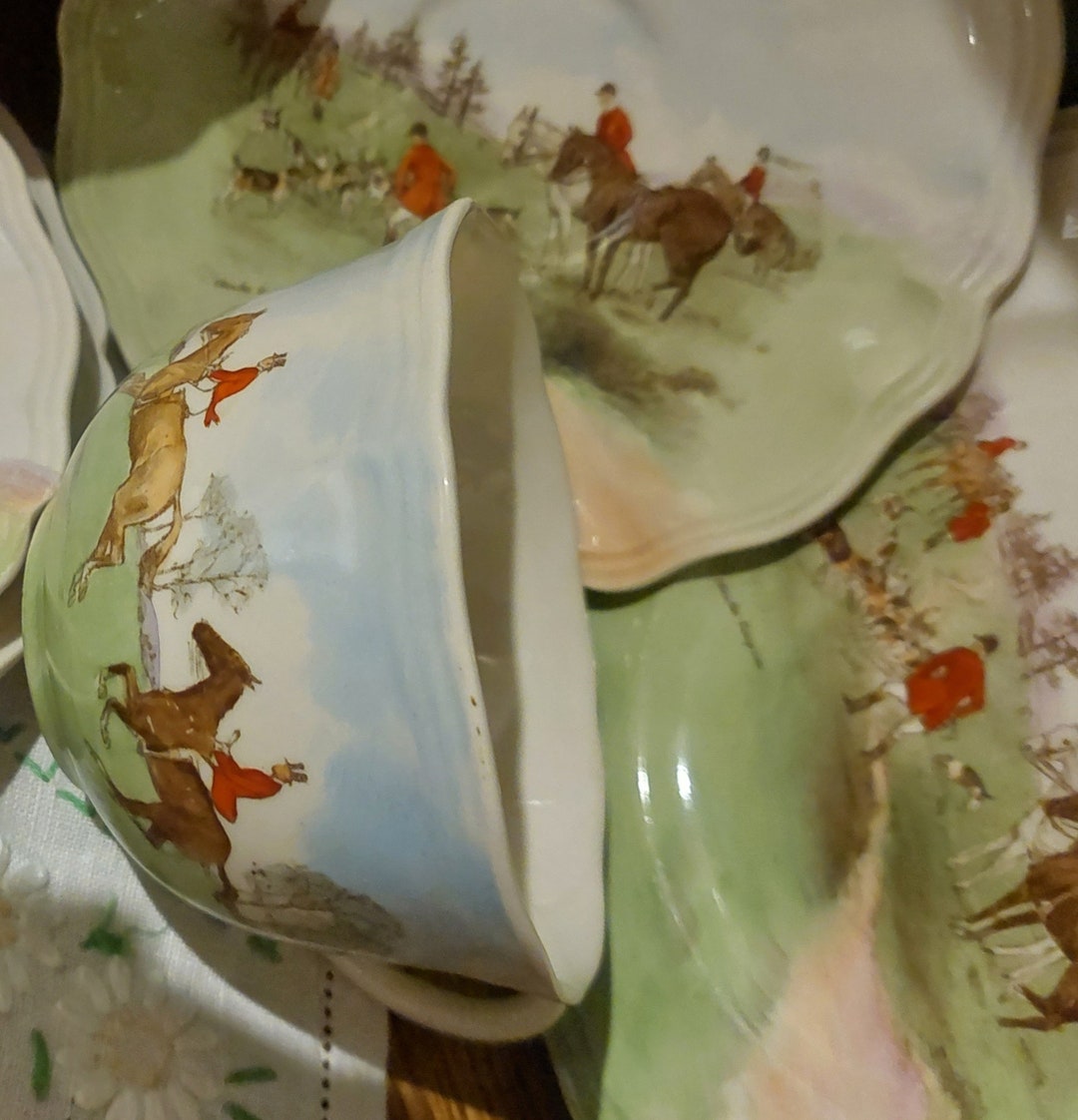 A Pair of Cups, Saucers and Tea Plates Featuring Charles Simpson's ...