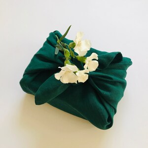 Green Reusable Gift Wrap With Fabric. Zero Waste Furoshiki Wrapping ...
