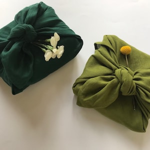 Green Reusable Gift Wrap With Fabric. Zero Waste Furoshiki Wrapping ...