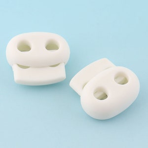 Cord Stopper 10pcs 20mm White Plastic Toggle Cord Two Hole Lock Stopper ...