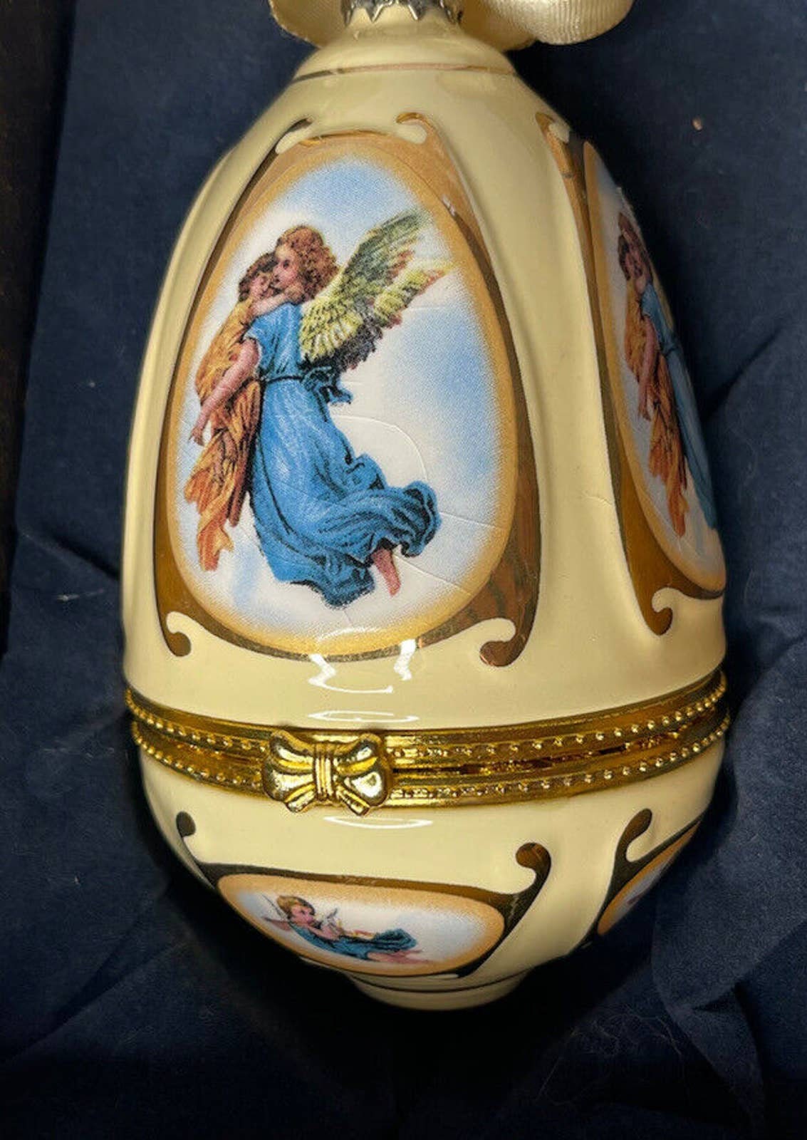 Mr. Christmas Musical Egg Shaped Angel Yellow Ornament Valerie Parr ...