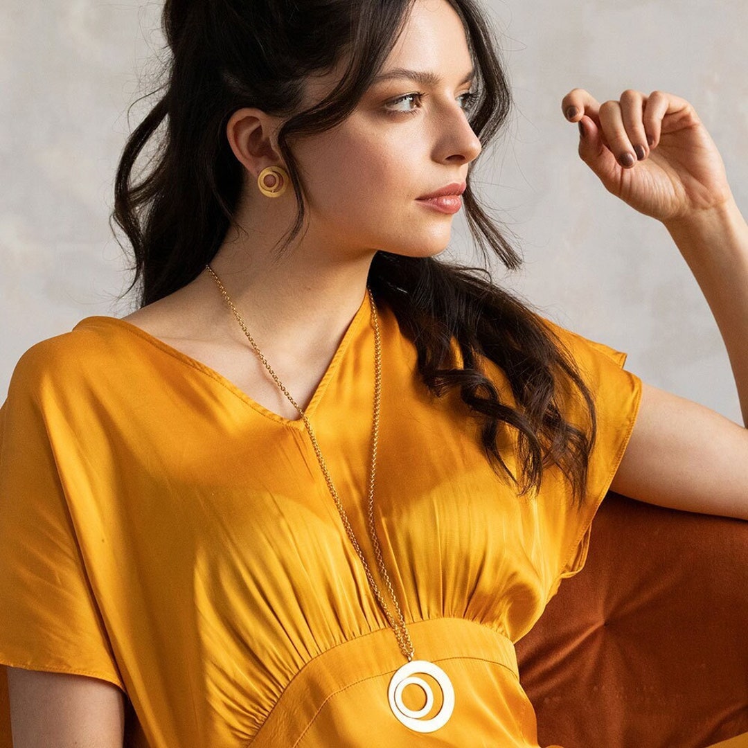 Long, Matt Chain With Two Circles Lying One Inside the Other, Gold ...