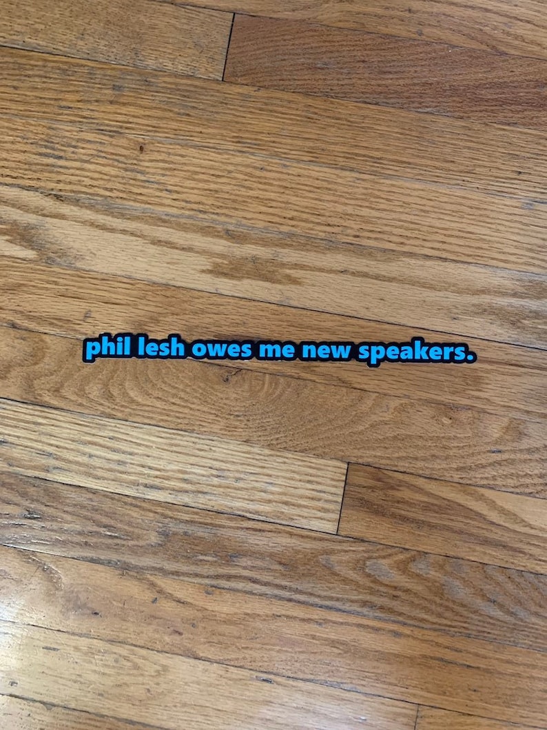 Phil Lesh Owes Me New Speakers Sticker - Black and Carolina Blue ...