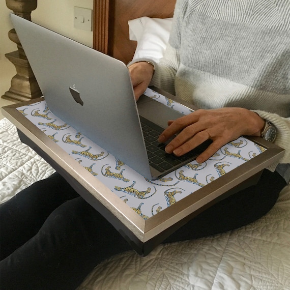 Lap table with cushion store