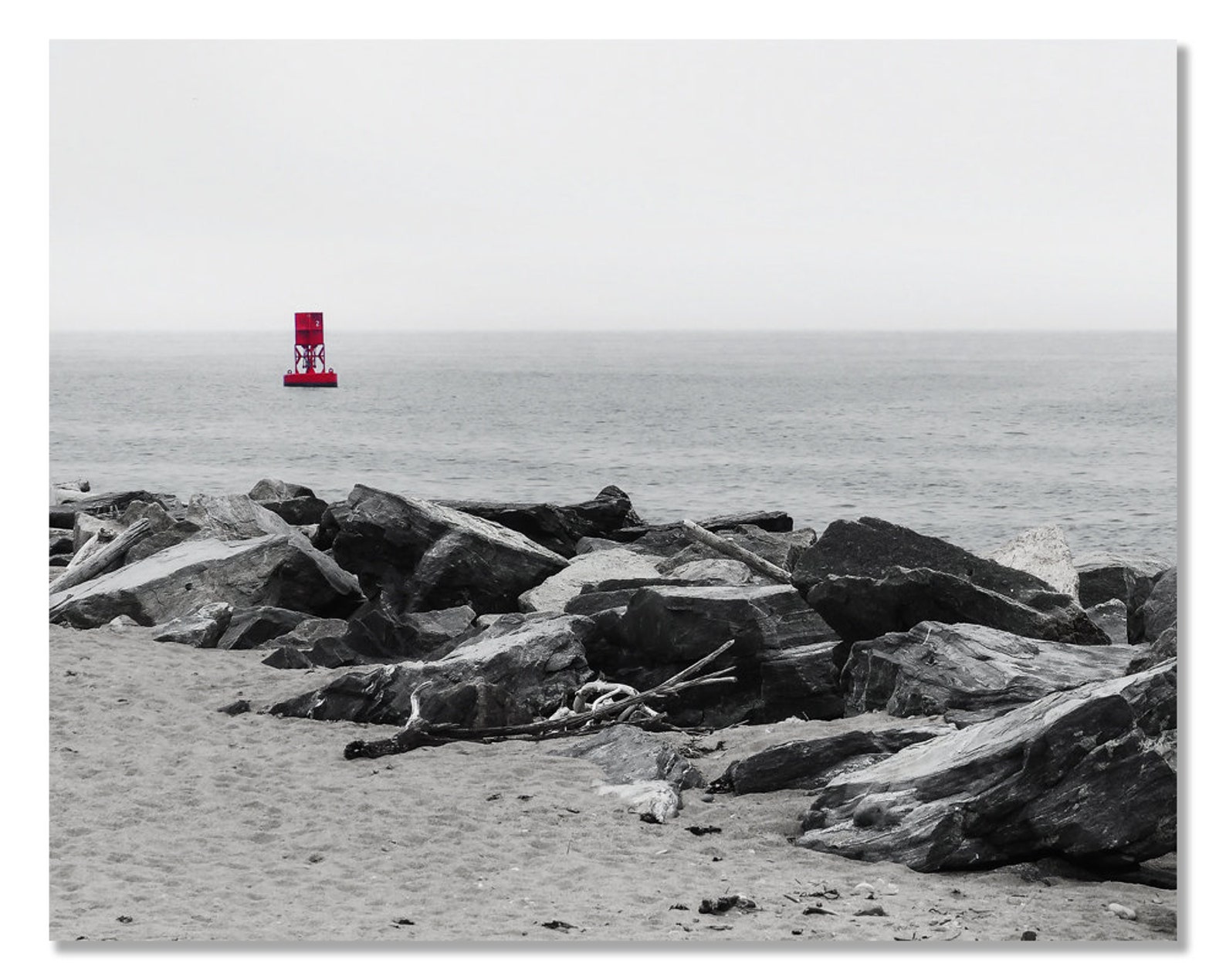 Red Buoy With Harbor Jetty Rocks and Ocean, Black and White Photo ...