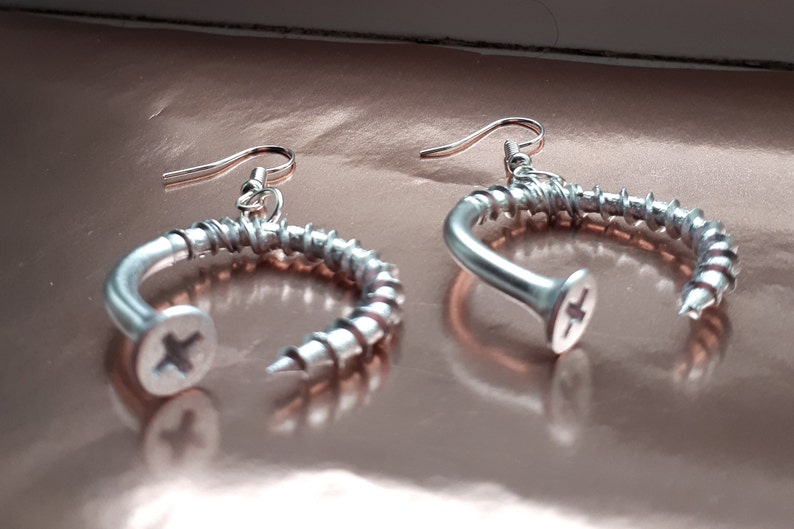 Handmade steel screw hoop earrings | Etsy