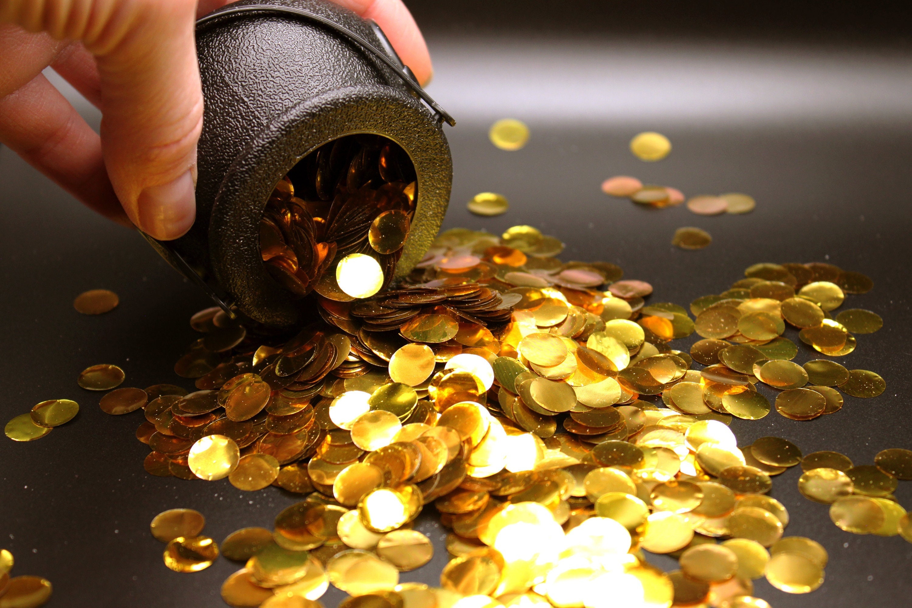 Gold Coins Falling From Pot