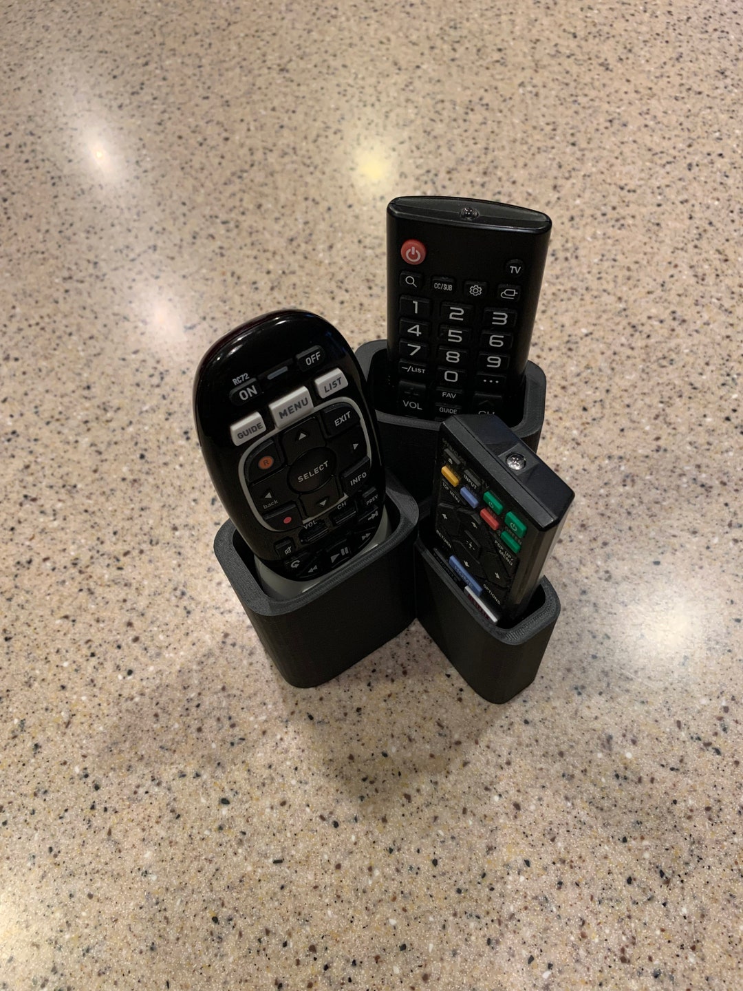 Remote holder/caddy/organizer for 3 remotes, one chubby compartment for ...