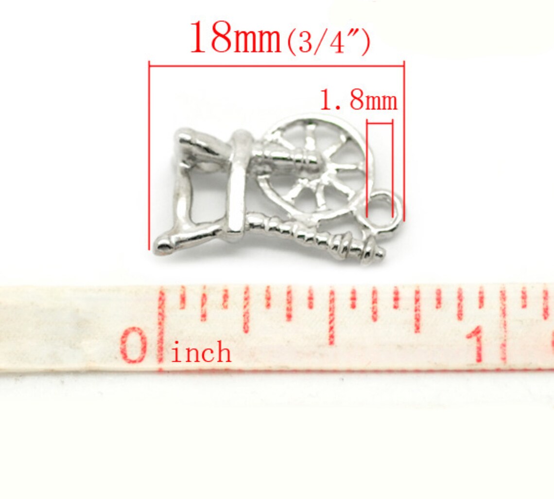 3D Spinning Wheel Charm - Etsy