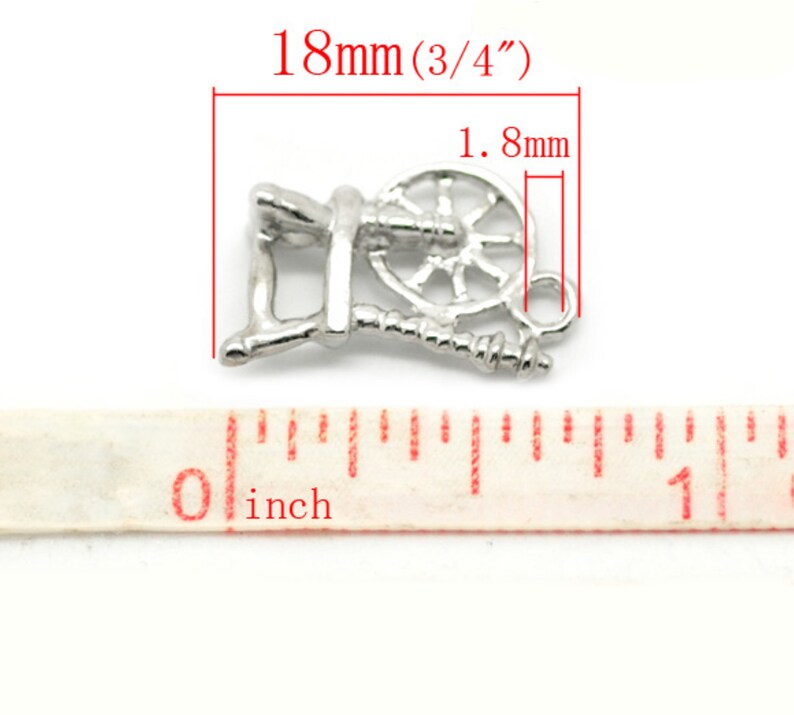 3D Spinning Wheel Charm - Etsy
