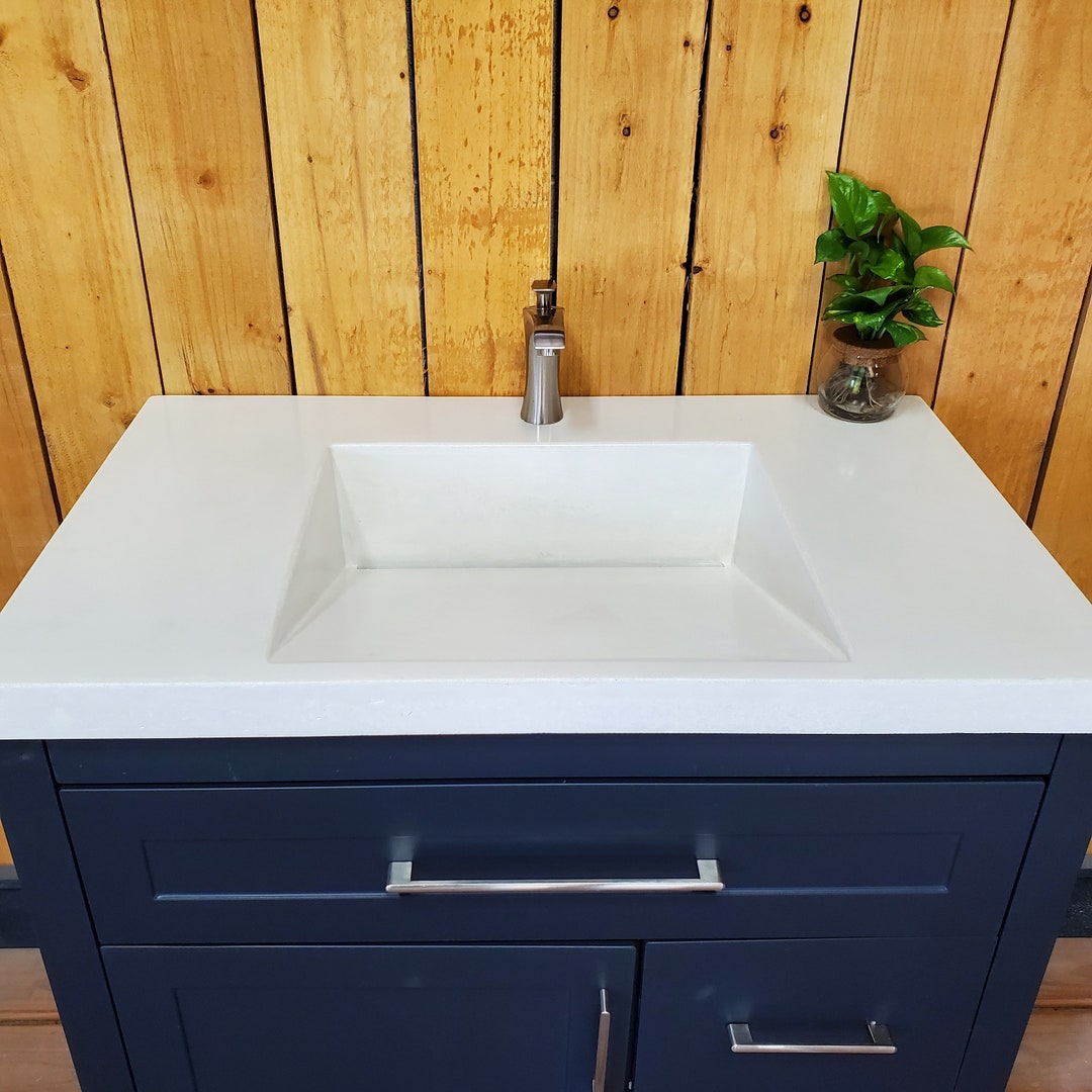 Bathroom Vanities A Bathroom Vanity With A Slot Drain Ramp Sink ...