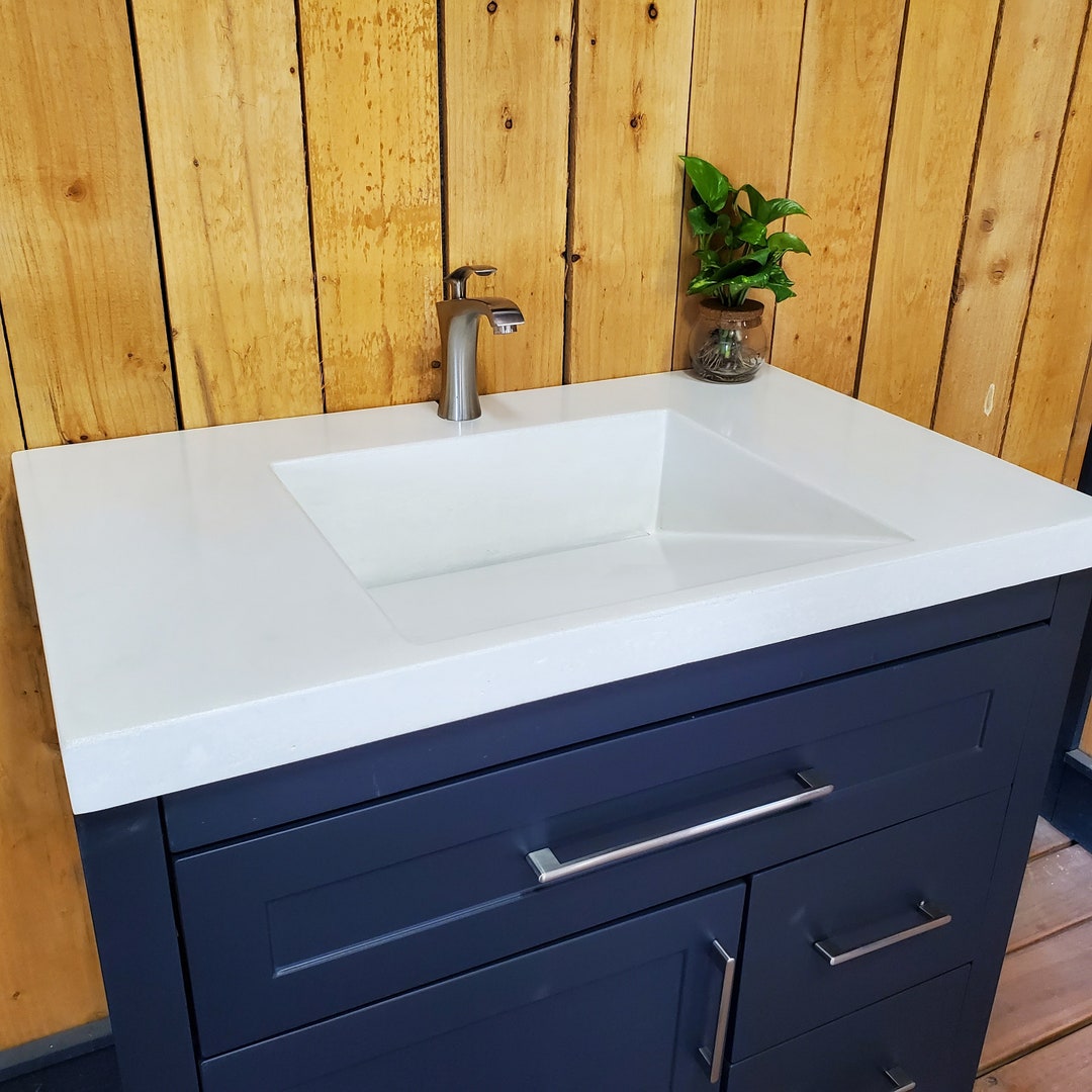 Bathroom Vanities A Bathroom Vanity With A Slot Drain Ramp Sink ...