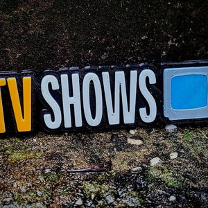 TV Shows Video Room Genre Sign for Movie Shelf - Television Room Sign ...