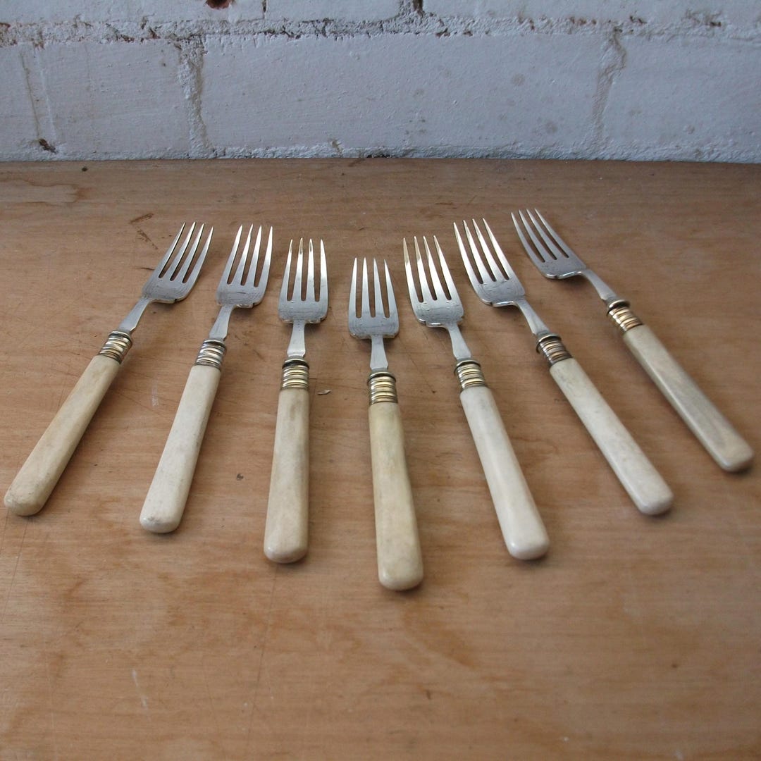 Set of Seven Bone Handled Forks With Brass Collars and Chased ...