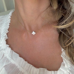 Van cleef white clover necklace store