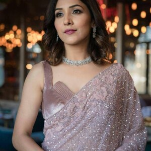 Light Pink Color Premium Hevy Georgette Fabric With All Over Sequence Work With Unique 3D Coding ...