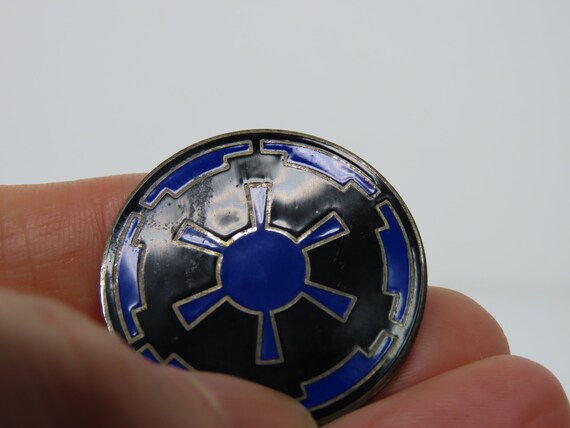 A vintage 1993 Star Wars enamelled pin, Galactic Empi… - Gem