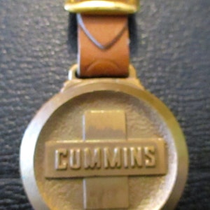 CUMMINS ENGINES Trademark Logo Pocket Watch Fob Advertising Promo ...