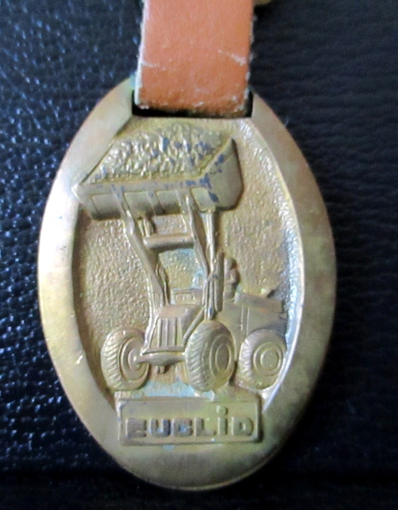 Vintage Euclid Pivot Steer Wheel Loader Brass Pocket Watch Fob 2 ...