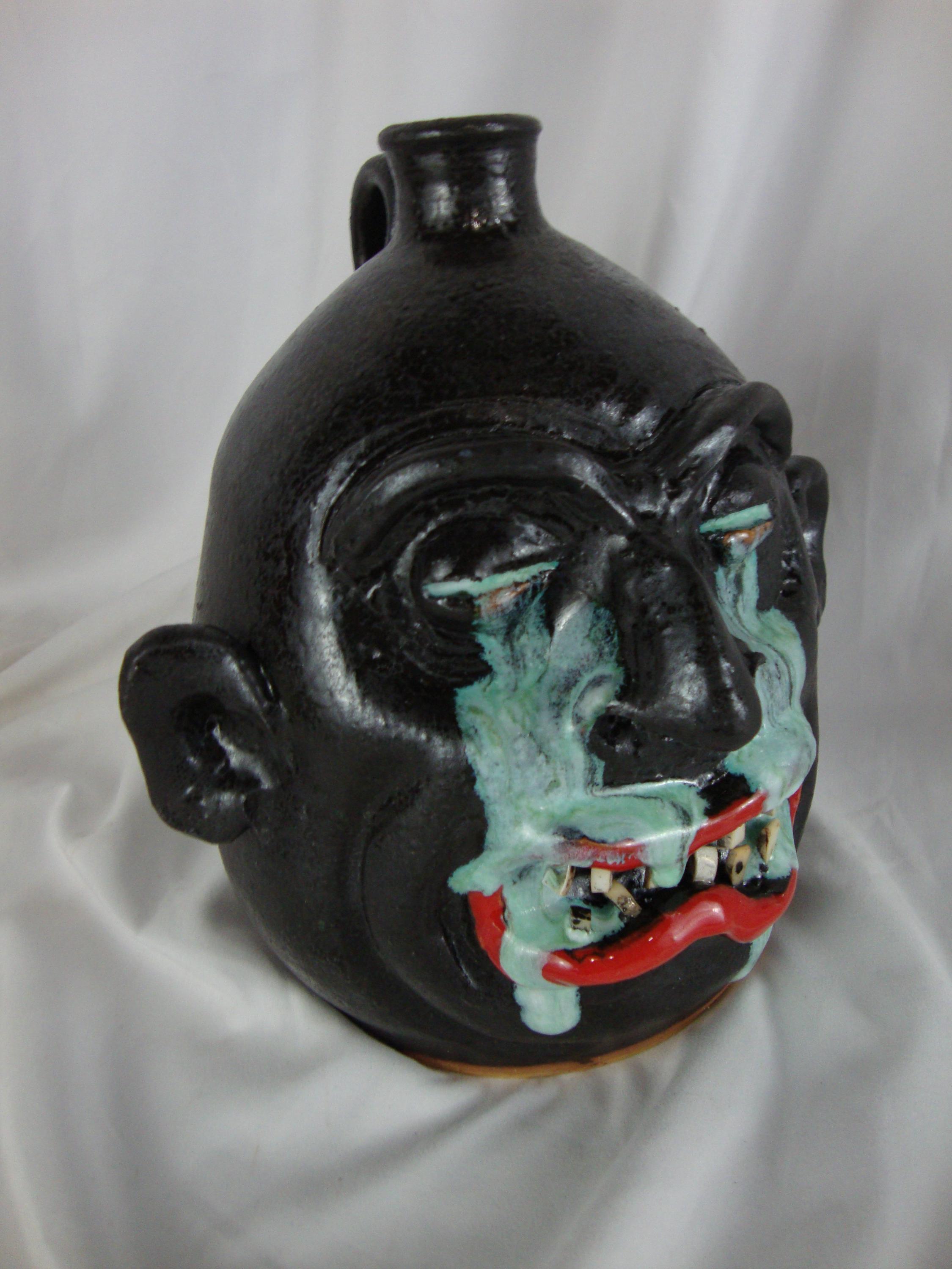 Marvin Bailey Pottery Dark Body With Aqua Crying Eyes Red Clown Lips ...