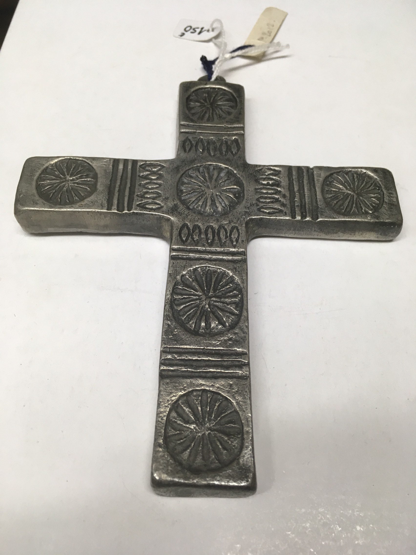 Art of religious tin. Pewter cross by the artist Arlette Laurent Dray