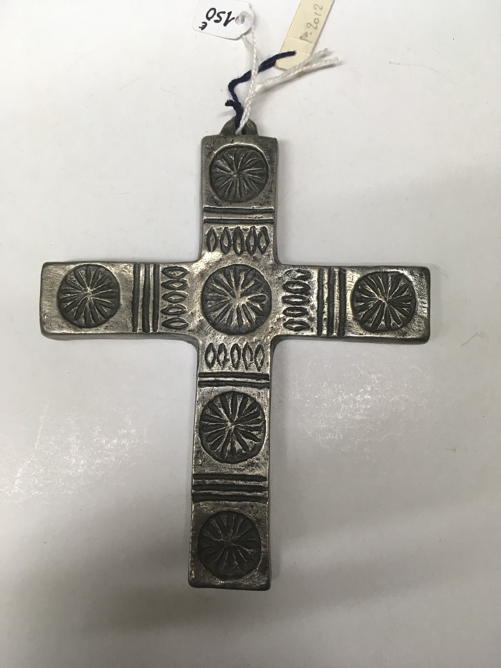 Art of religious tin. Pewter cross by the artist Arlette Laurent Dray