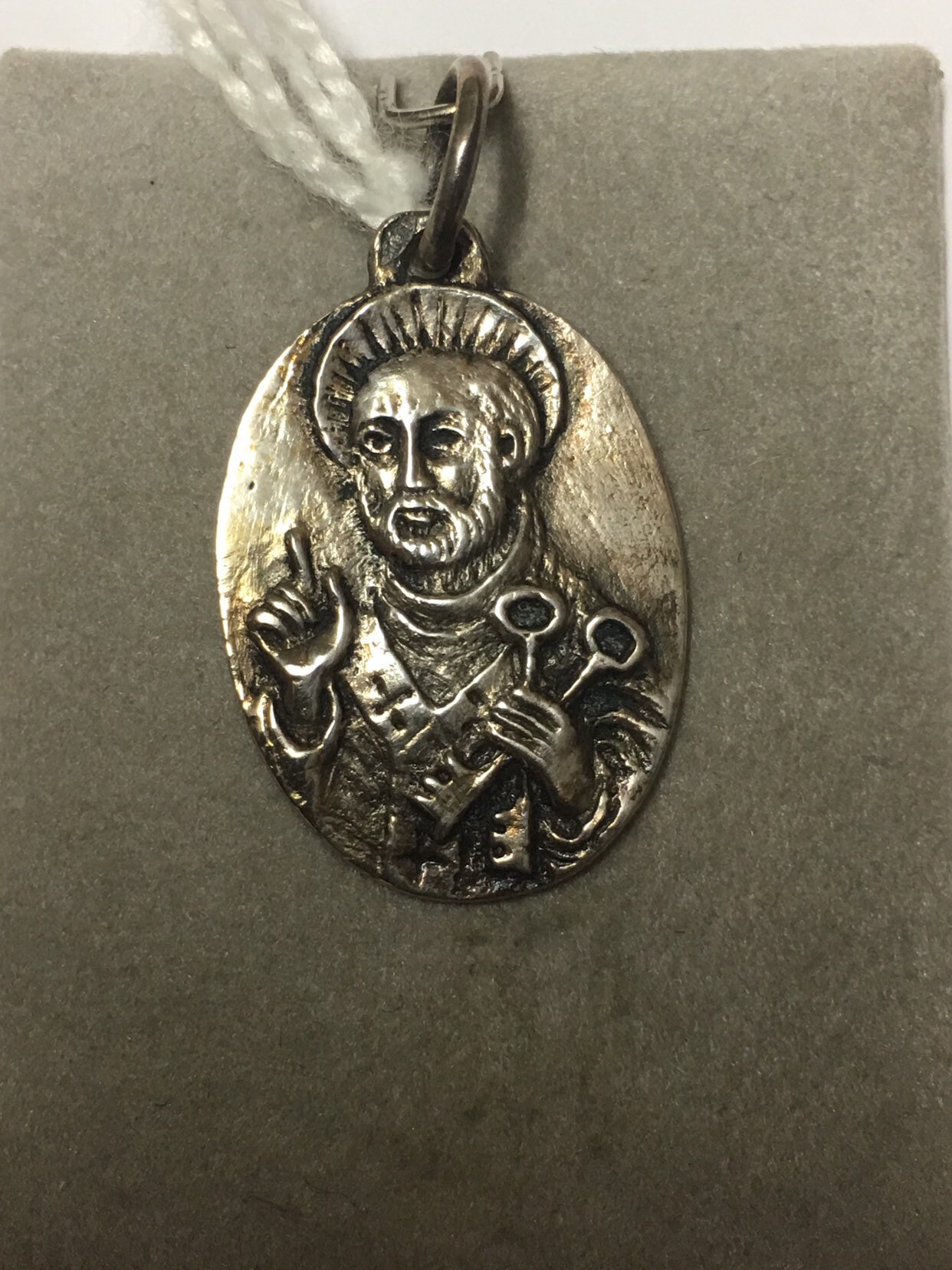 Religious medal in ancient stone saint silver
