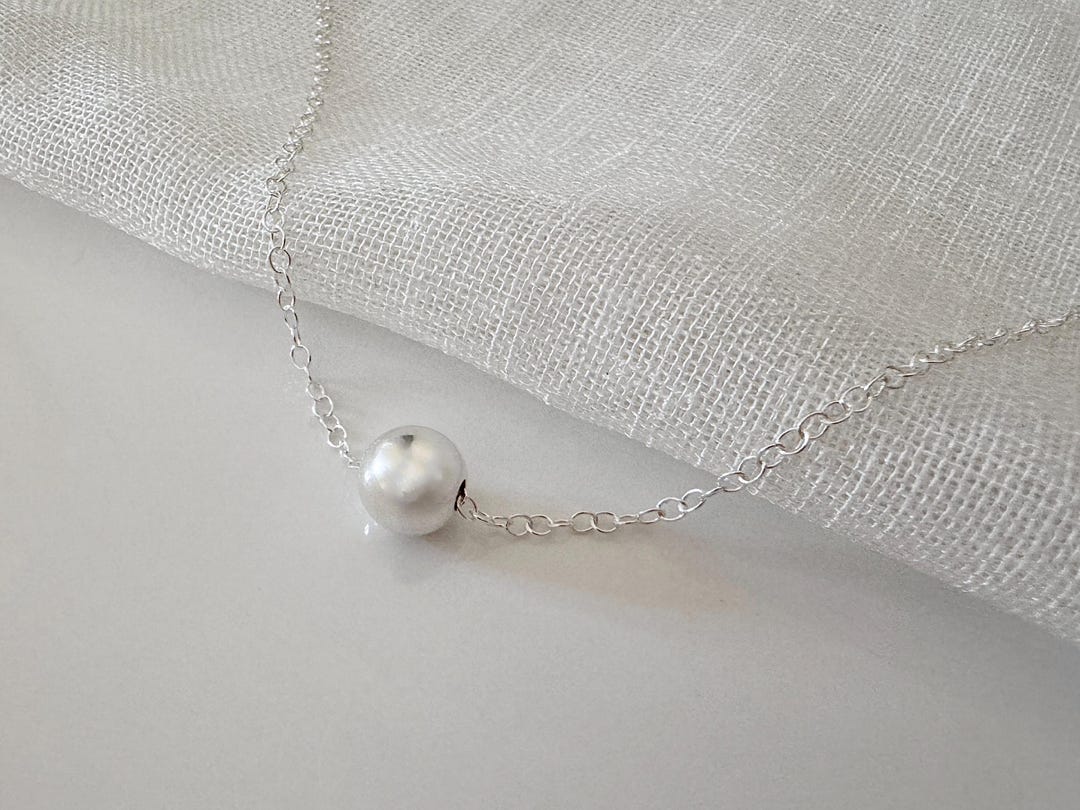 Silver ball pendant store