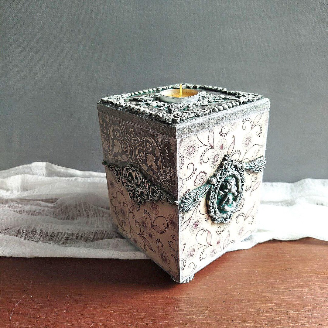 A Beautiful Beige Box With a Lid Decorated With Angels. A Candlestick ...