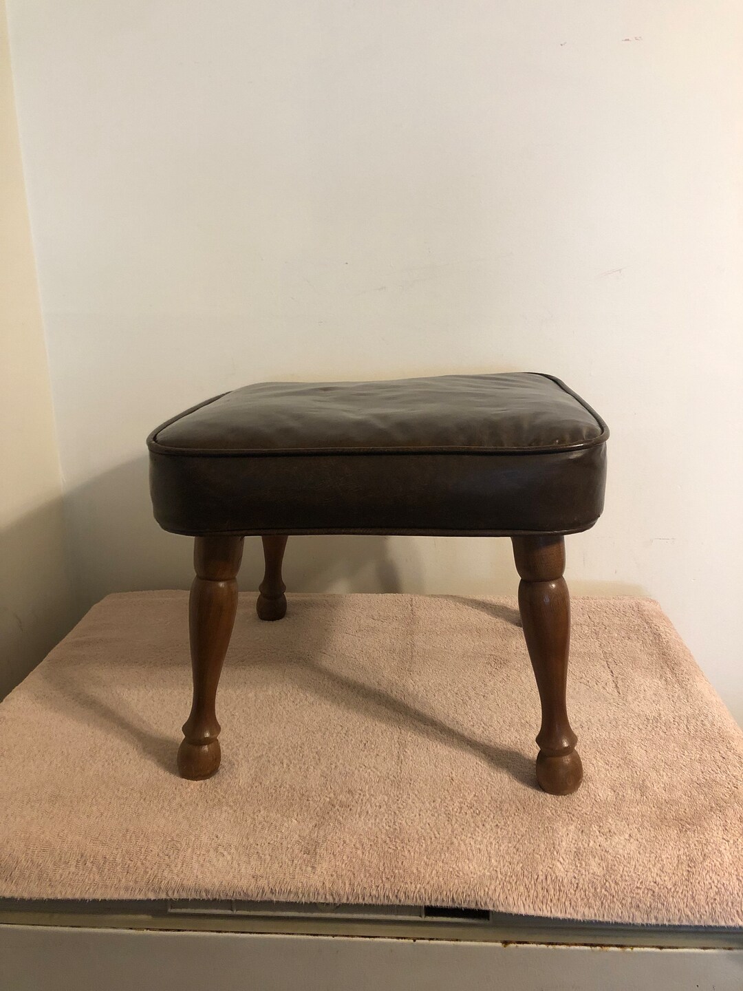 Vintage MCM Brown Naugahyde Hassock Foot Stool With Turned Wood Legs - Etsy